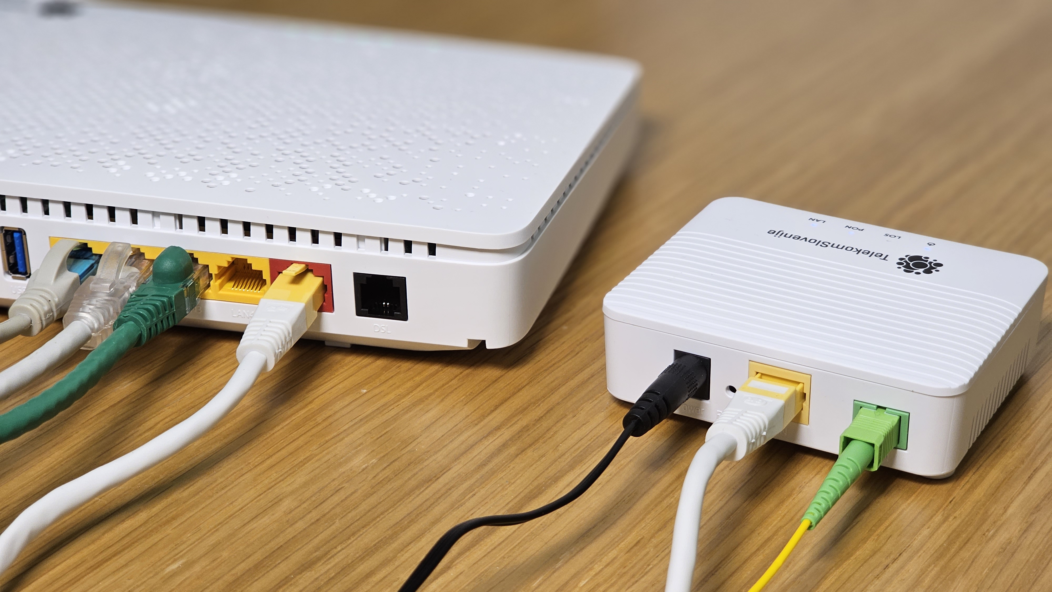 Navodila za priklop modema v optično omrežje - Telekom Slovenije